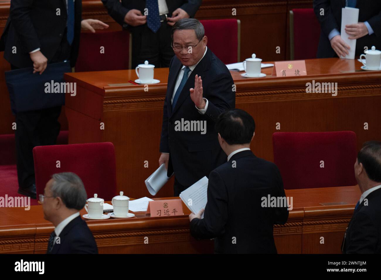 Chinese Premier Li Qiang, centre, leaves after the opening session of ...