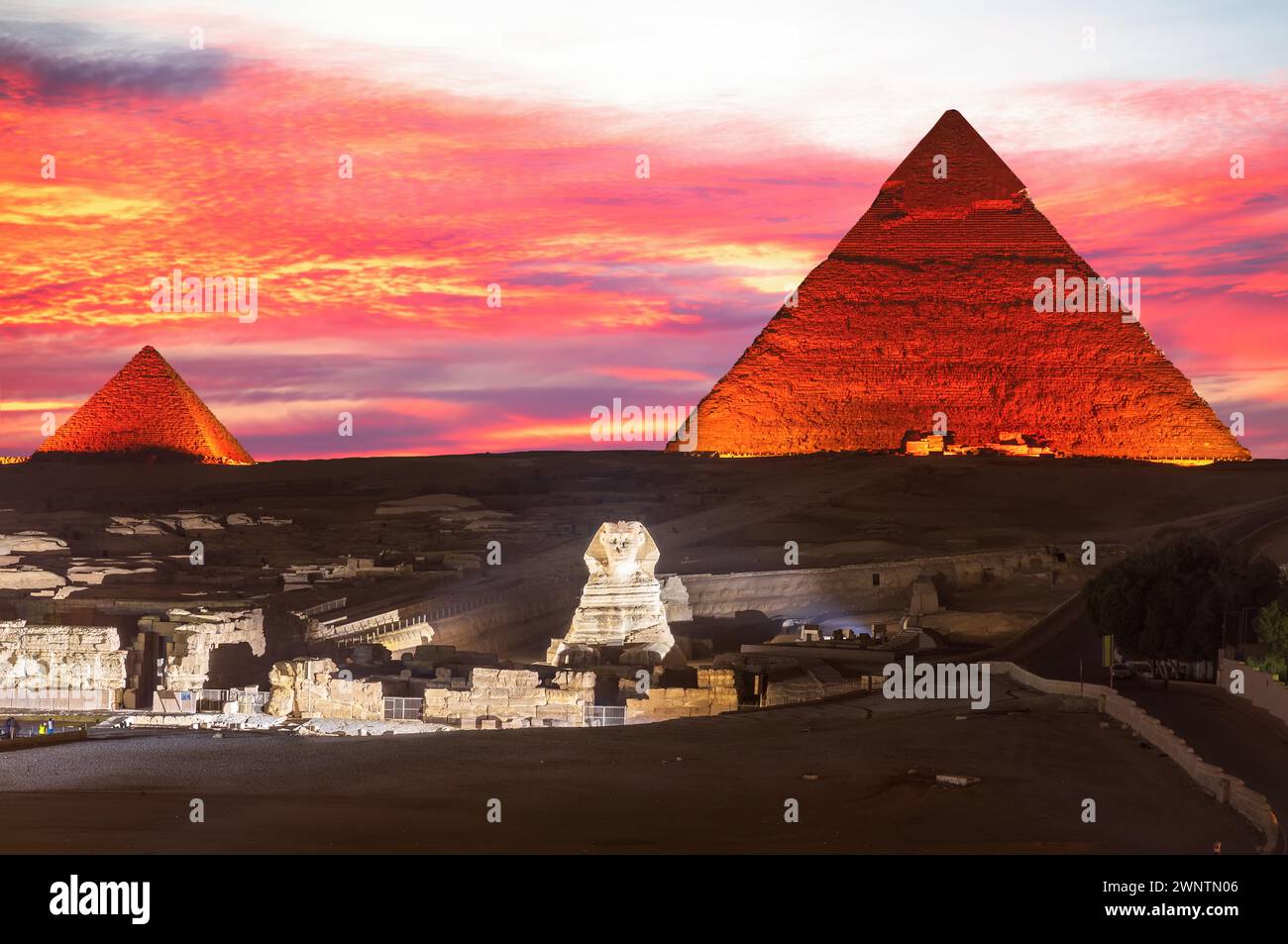 Illuminated Pyramids of Egypt and the great Sphinx night view, Giza ...