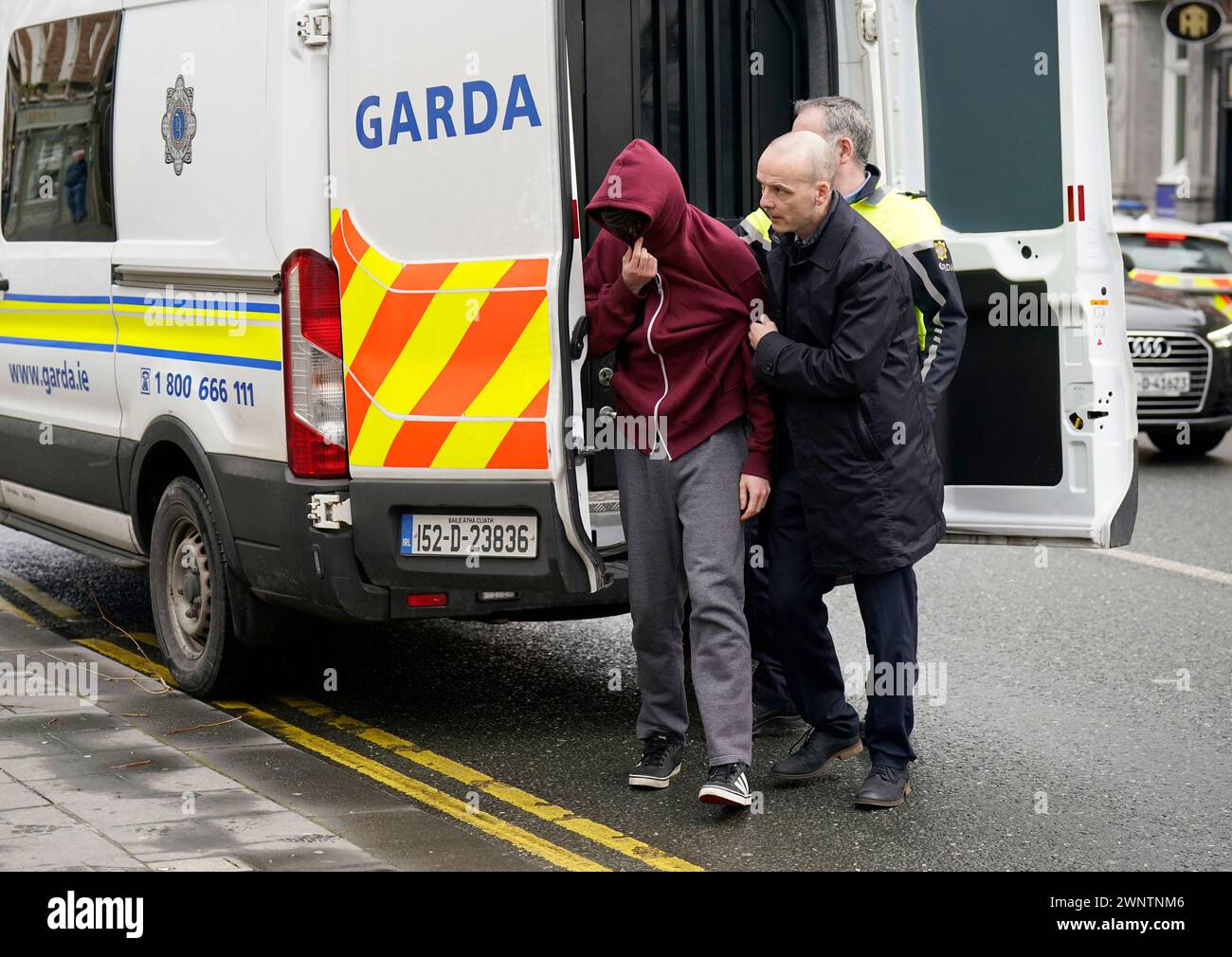 Shane Kinsella (left) is led into Naas District Court, Co Kildare ...