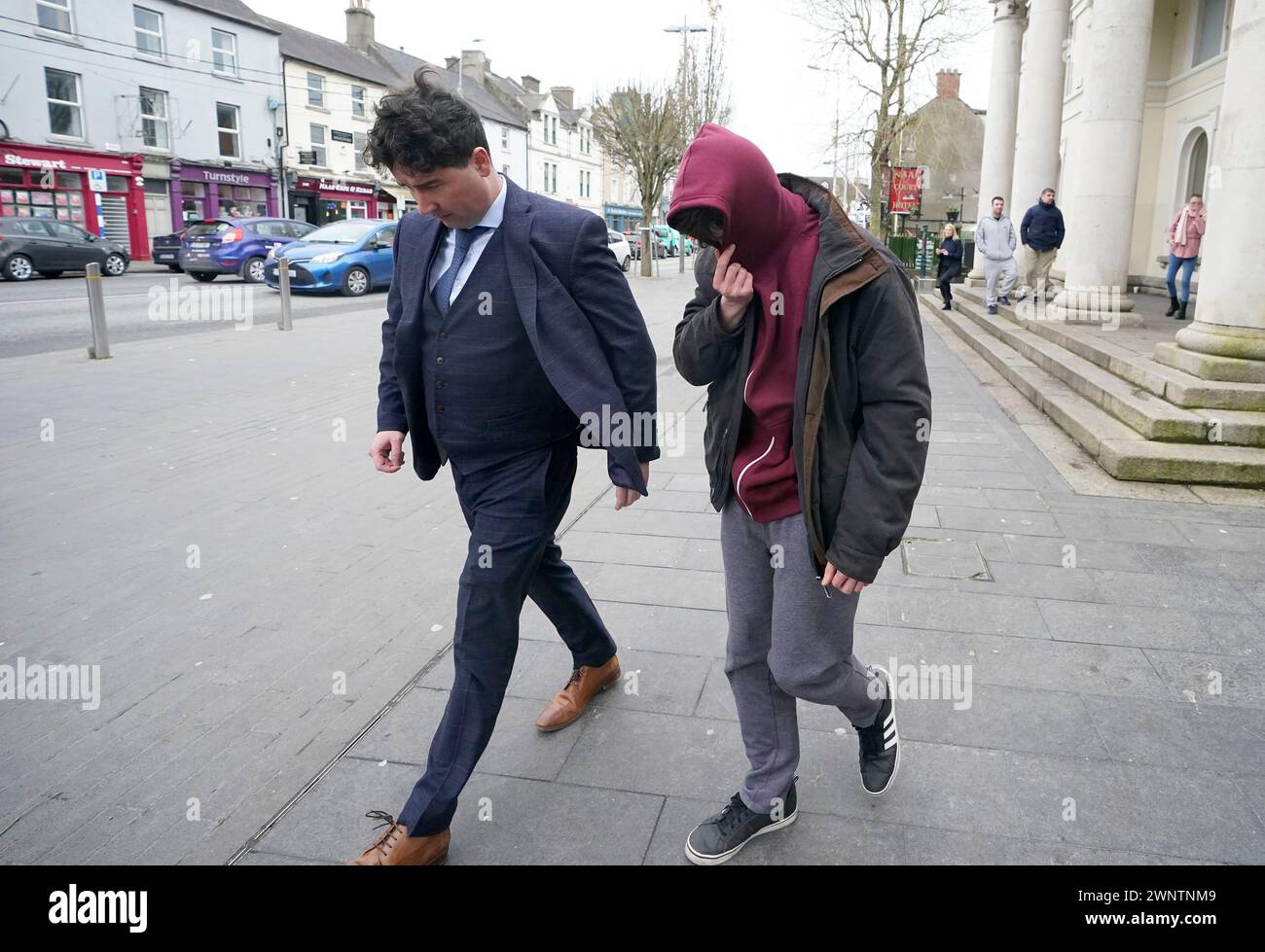 Shane Kinsella (right) leaves Naas District Court, Co Kildare, where ...