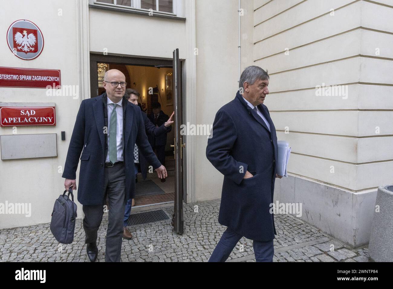 Warshaw, Poland. 04th Mar, 2024. Jambon's chef of cabinet Jeroen Overmeer and Flemish Minister ...