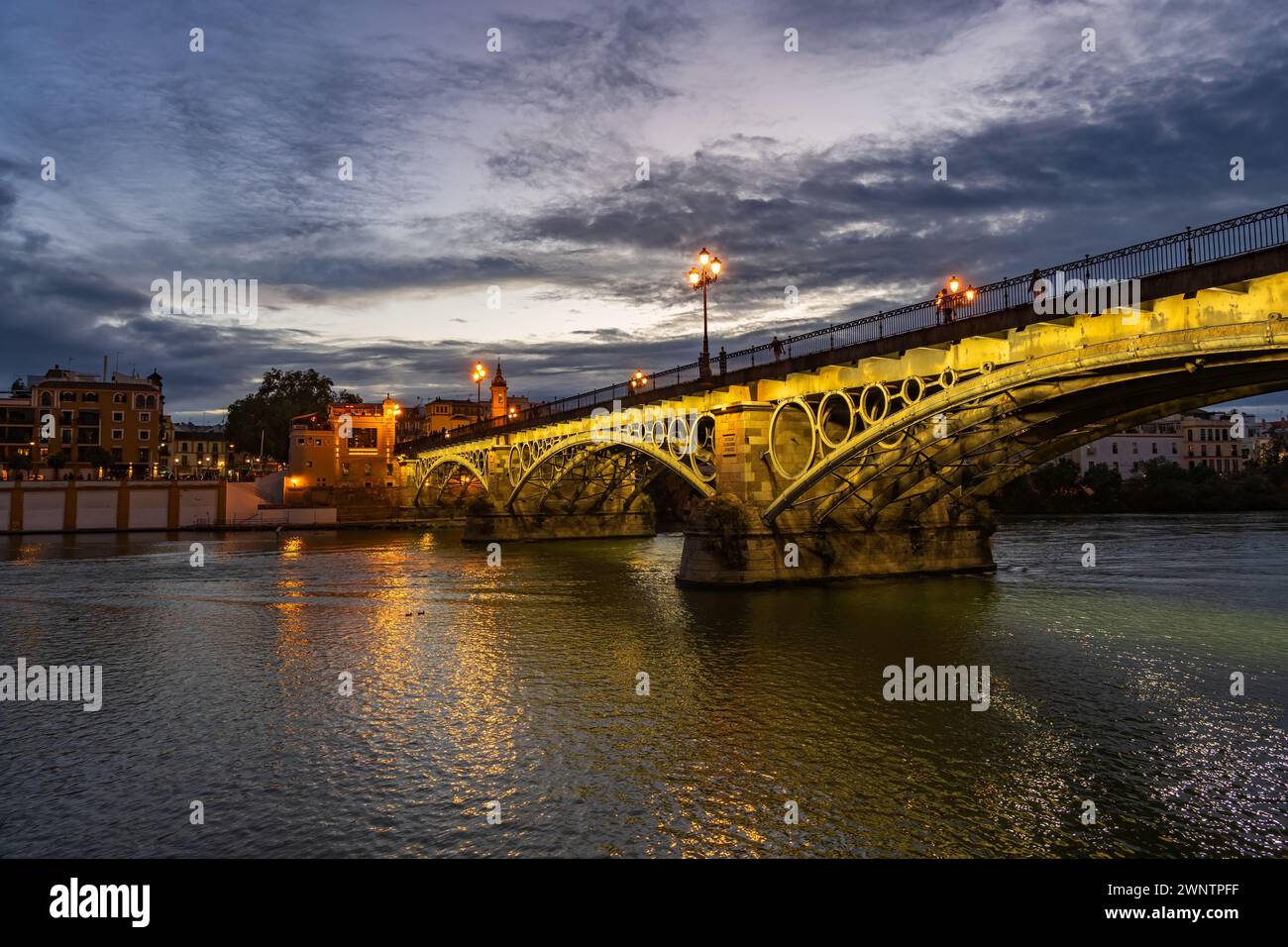 Evening at Triana Bridge - Puente de Isabel II across Guadalquivir ...