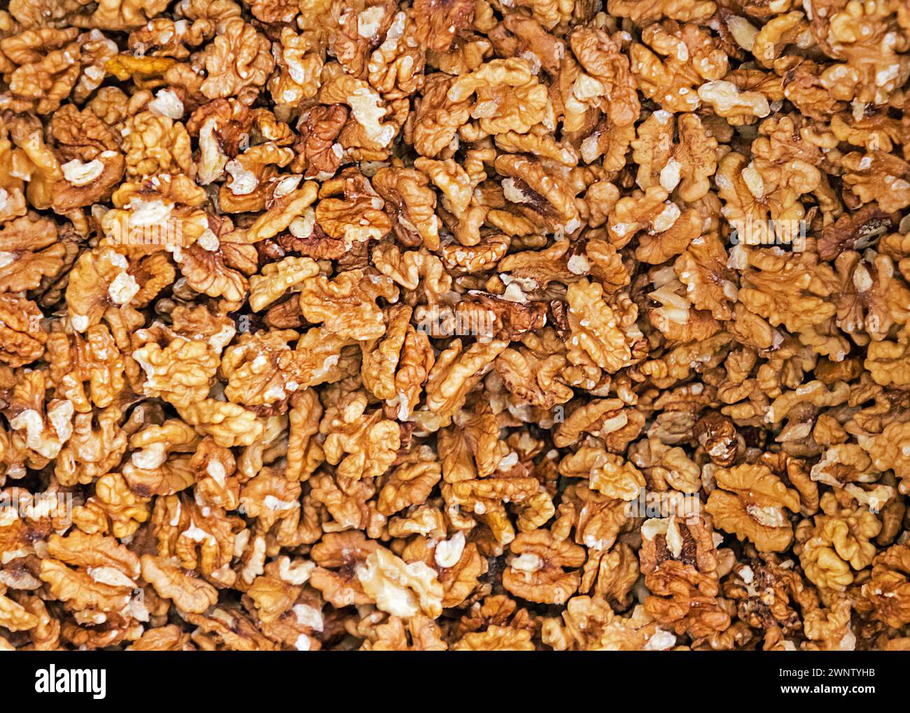 Walnuts pile outside of shells on a market stall Stock Photo - Alamy