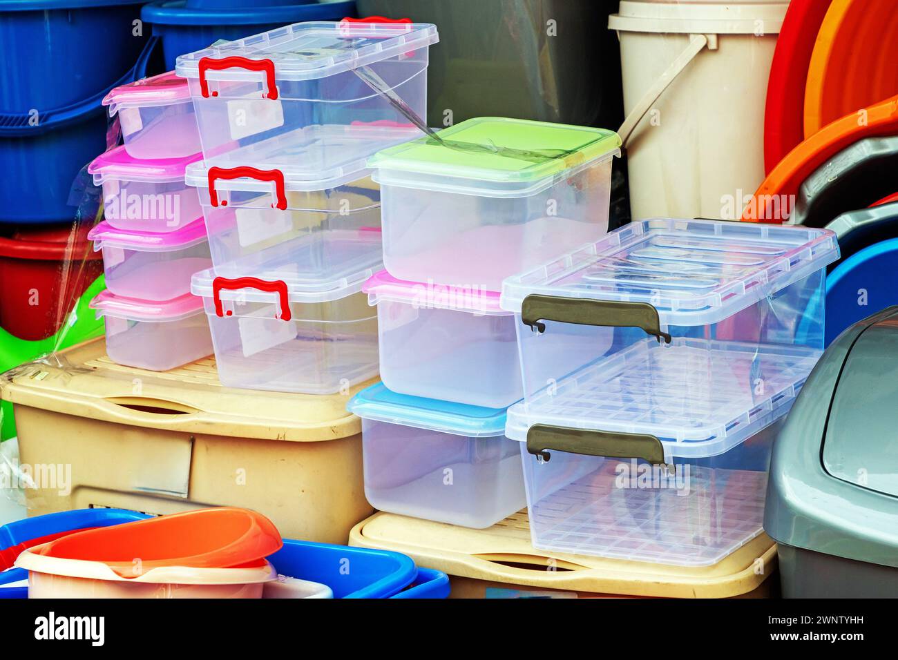 Closed plastic boxes stack on a market place outdoors Stock Photo - Alamy