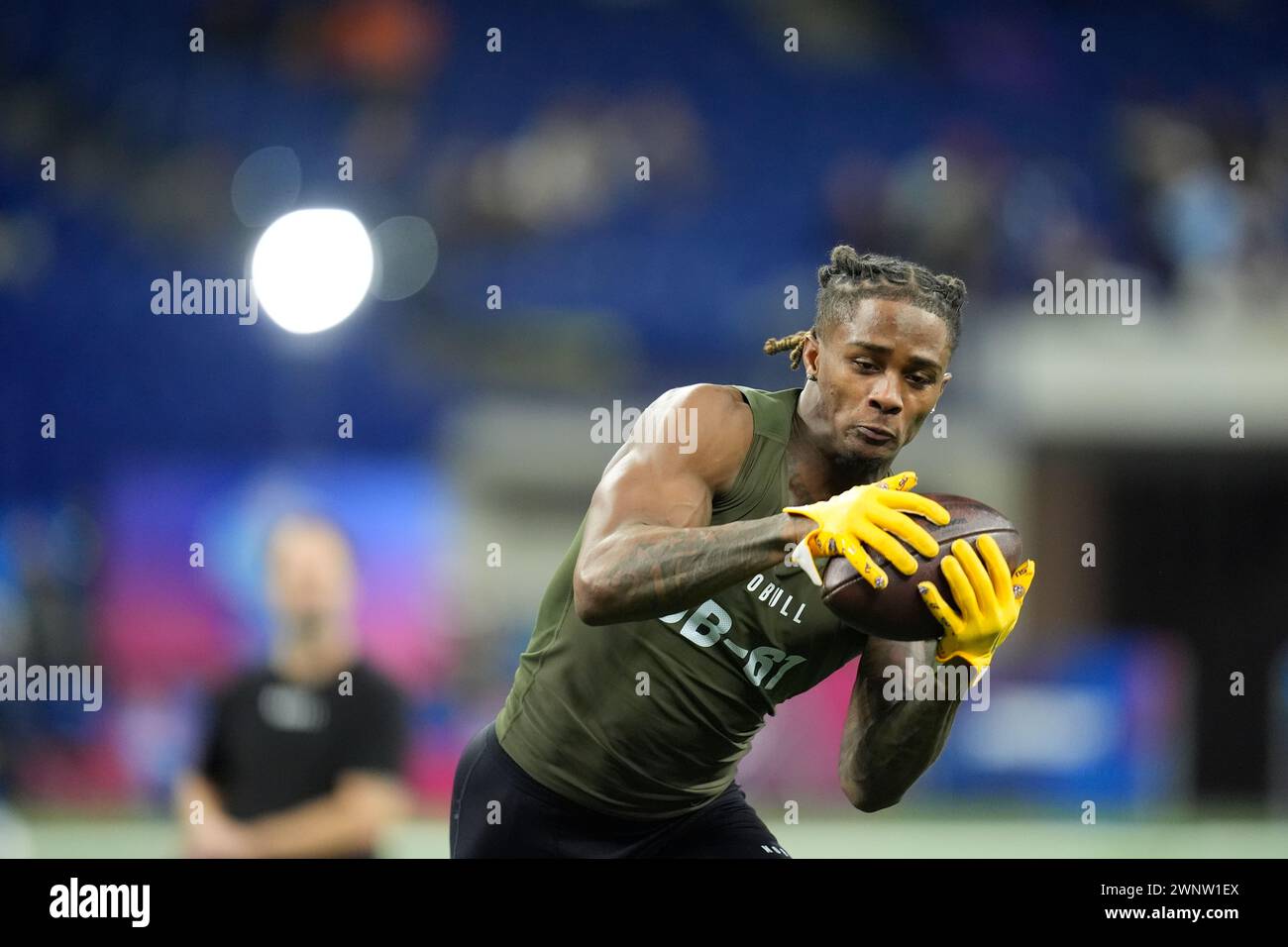 LSU defensive back Andre Sam runs a drill at the NFL football scouting ...