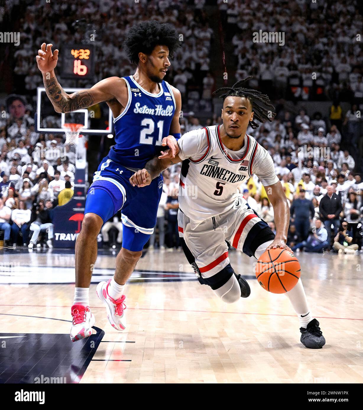 UConn guard Stephon Castle (5) is guarded by Seton Hall guard Isaiah ...