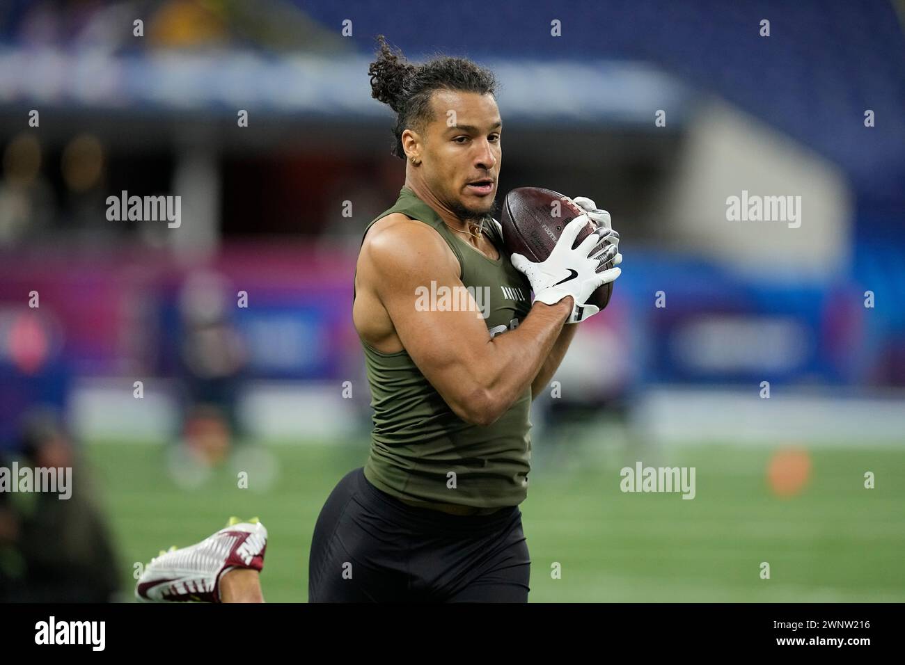 Washington State defensive back Jaden Hicks runs a drill at the NFL ...