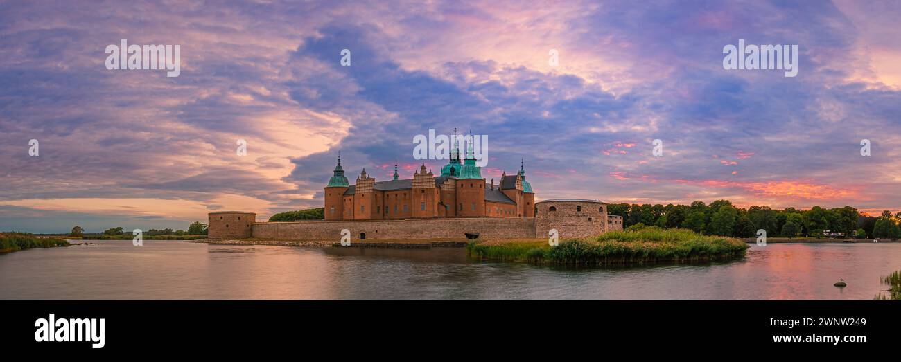A wide 3:1 panoramic photo from a summer evening sunset at Kalmar ...