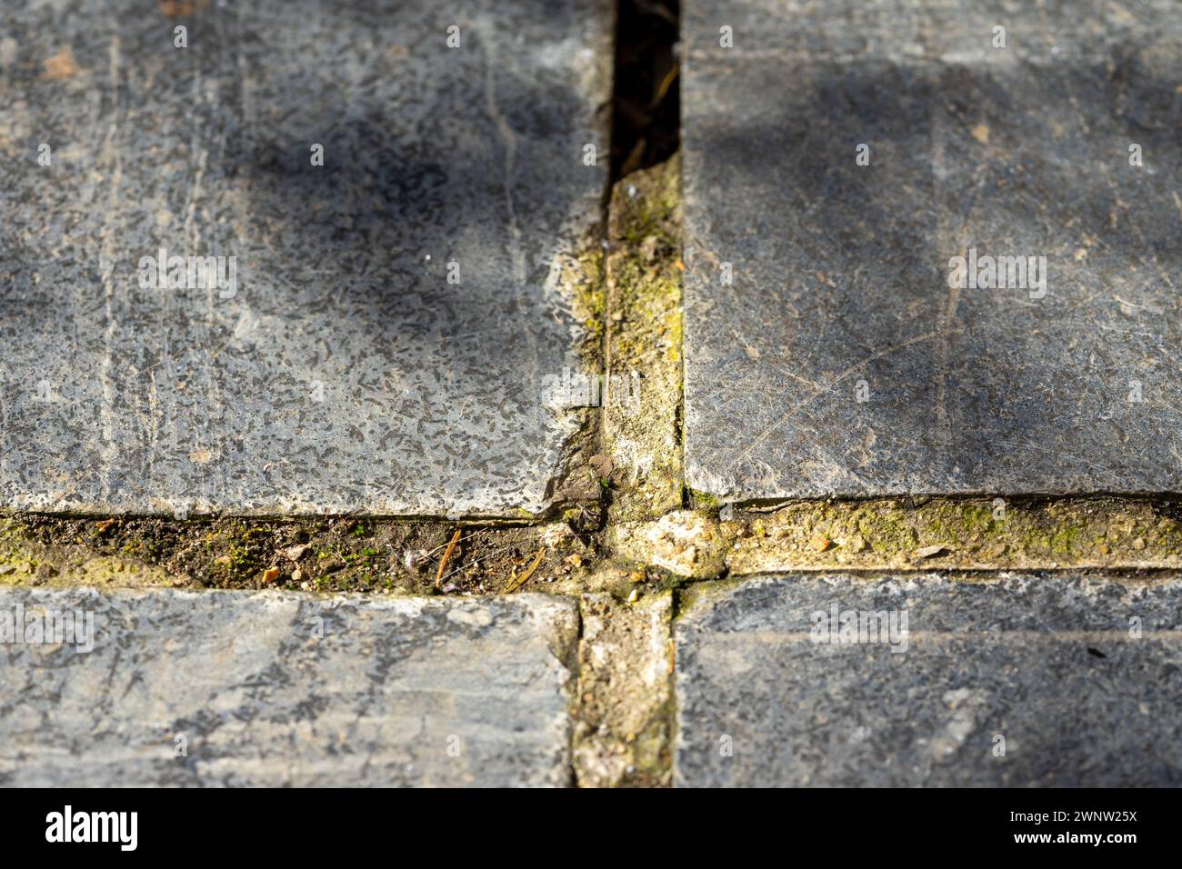 Structural damage on a terrace. Concrete joint broken Stock Photo - Alamy
