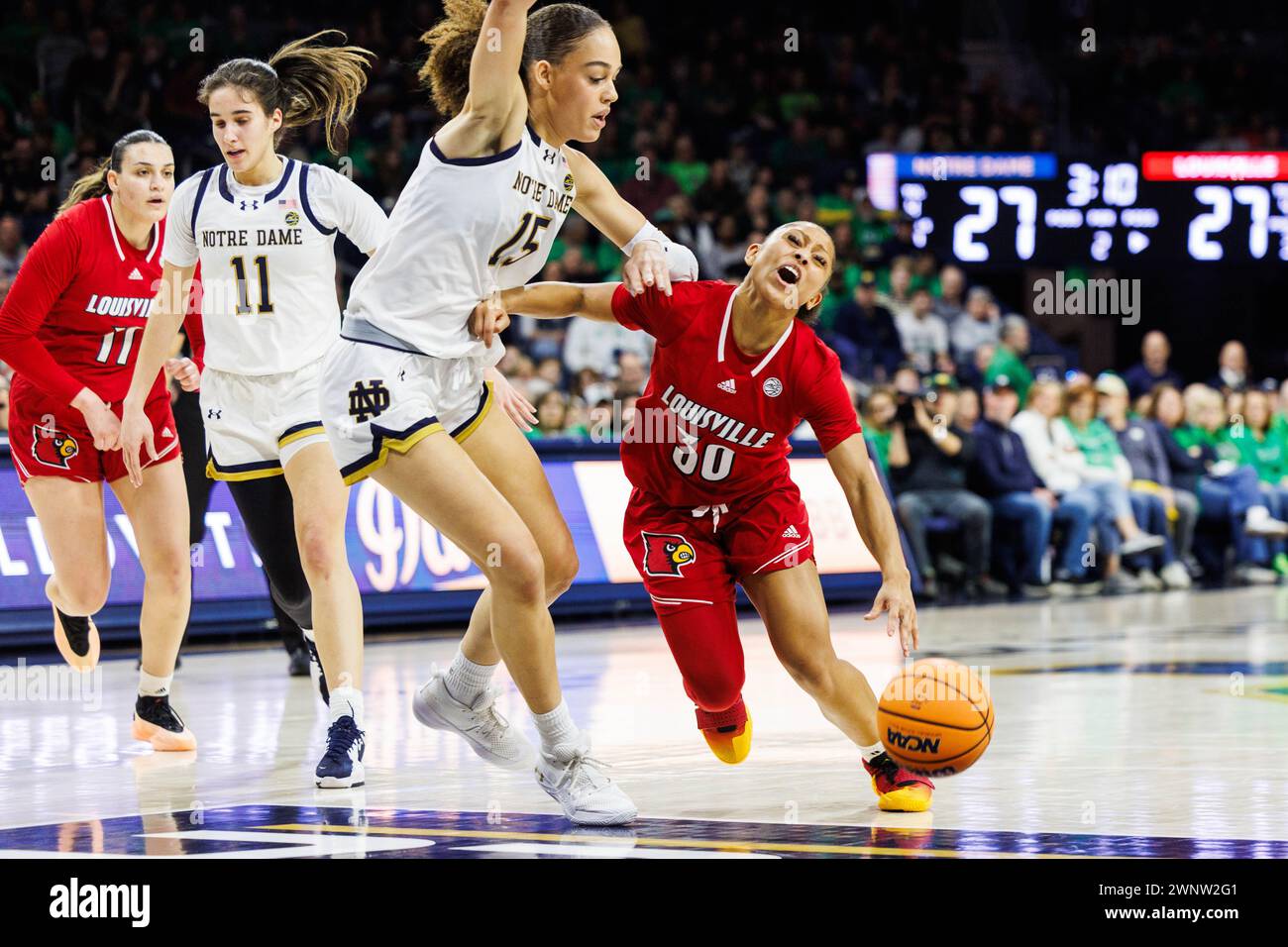 March 03, 2024: Louisville guard Jayda Curry (30) drives to the lane as ...