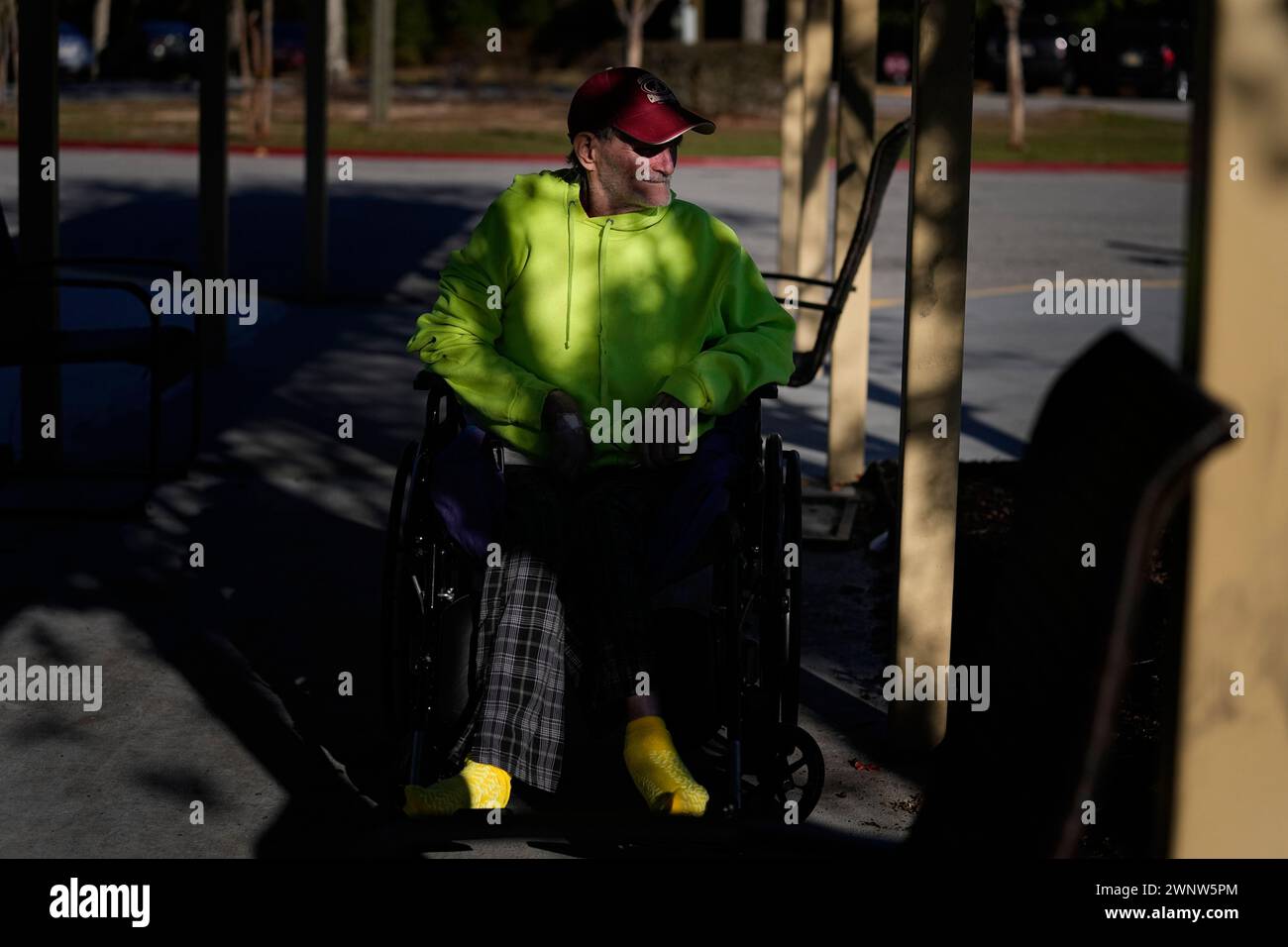 Tony McGuire looks to the parking lot of the community center where he ...