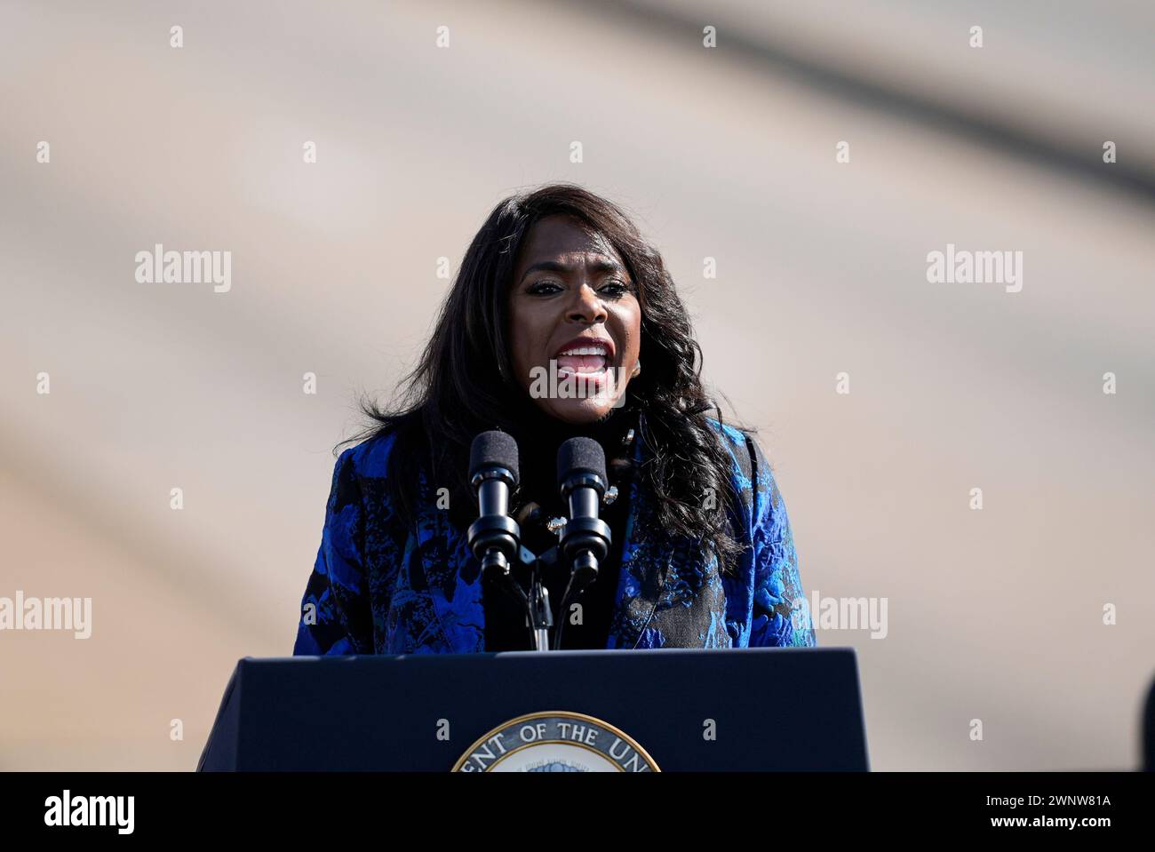 Congresswoman Terri A. Sewell speaks before walking across the Edmund ...