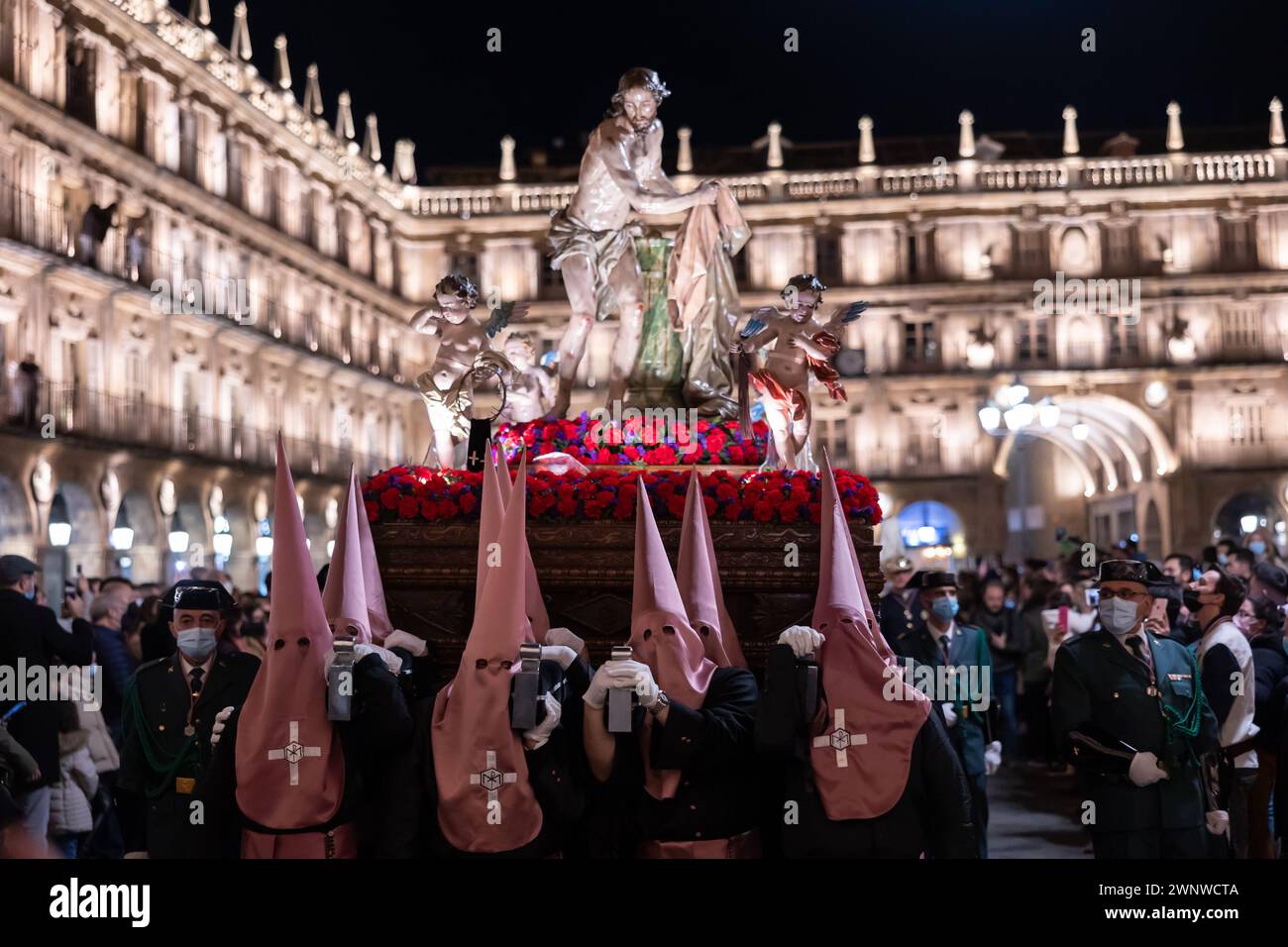Religious brotherhood carrying paso of Flagellated Jesus during Holy ...