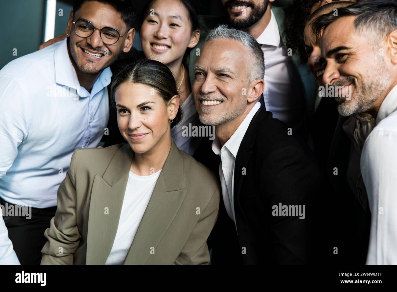 Multiracial group of successful business people taking a selfie outside ...
