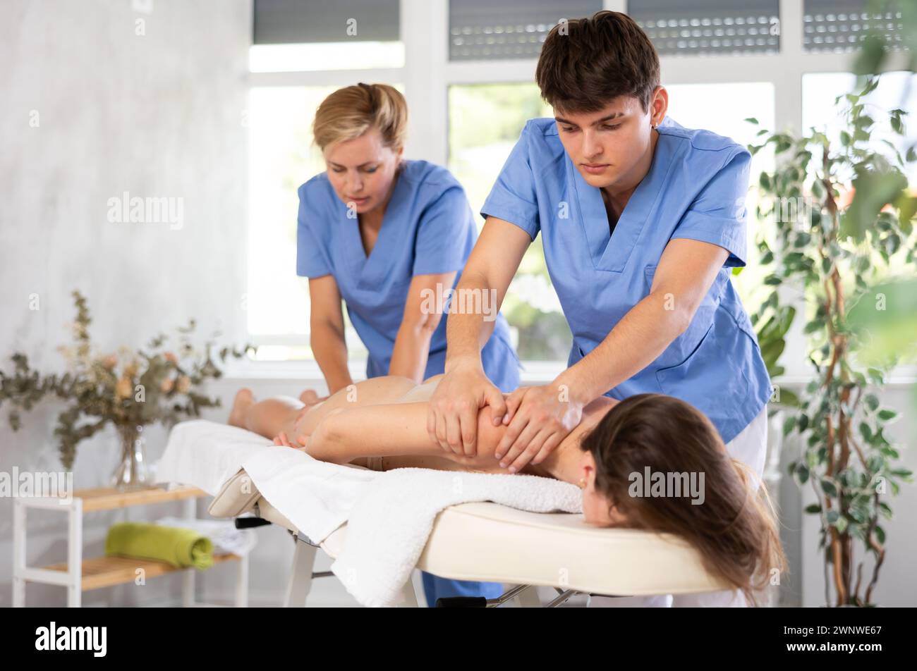 Four hands massage hi-res stock photography and images - Alamy