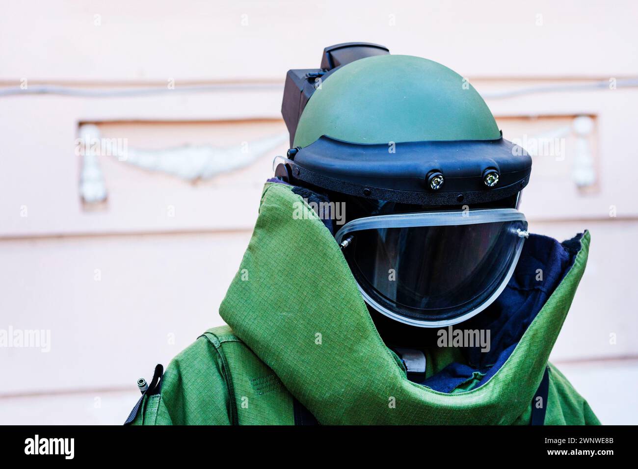 Armor costume consisting of a steel helmet. The concept of demining of ...