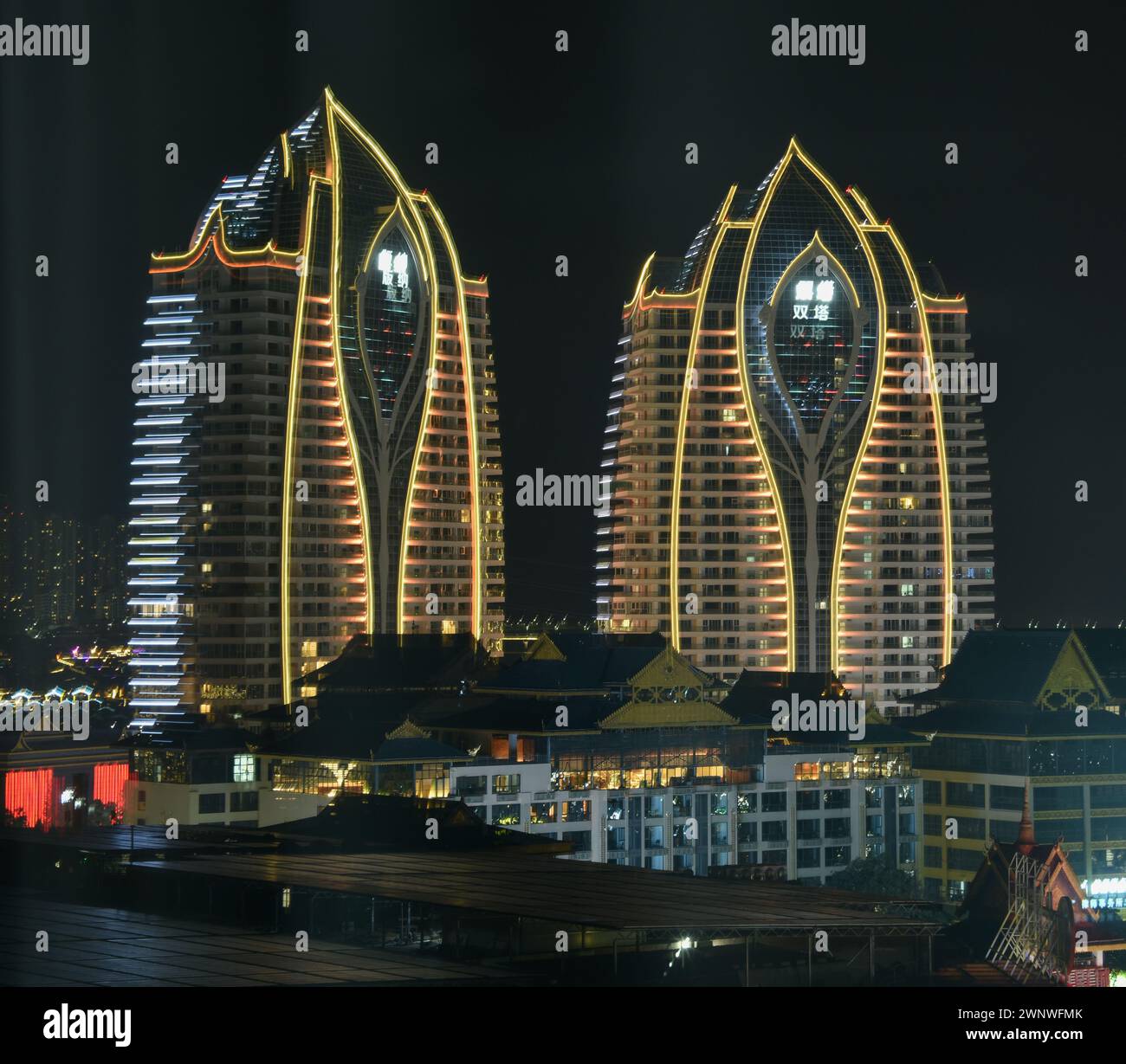 Xishuangbannan, China. 04th Mar, 2024. The 127-meter-high twin towers ...