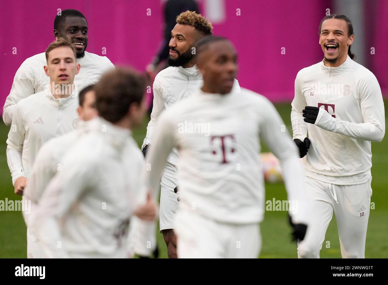 Bayern's Leroy Sane, rear right, laughs besides team mates Dayot ...