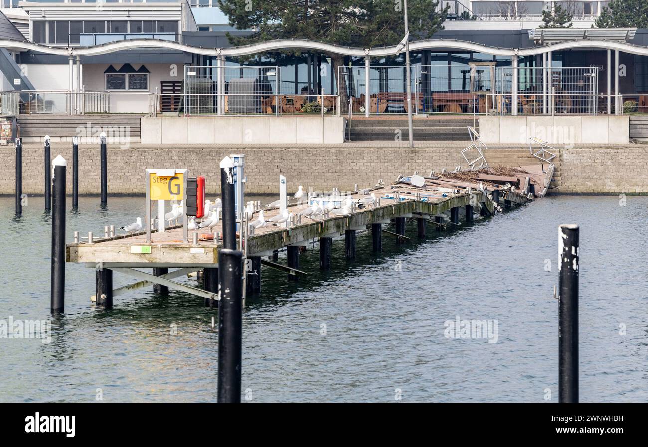 PRODUCTION - 04 March 2024, Schleswig-Holstein, Damp: A damaged jetty ...