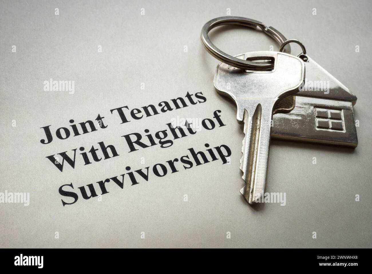 Key lie on paper with a mark Joint tenants with right of survivorship ...
