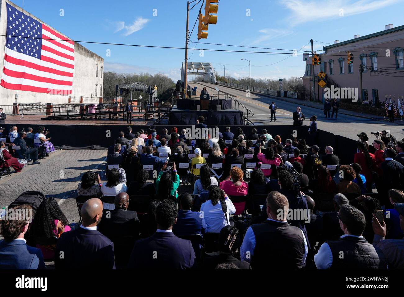Vice President Kamala Harris speaks before walking across the Edmund ...