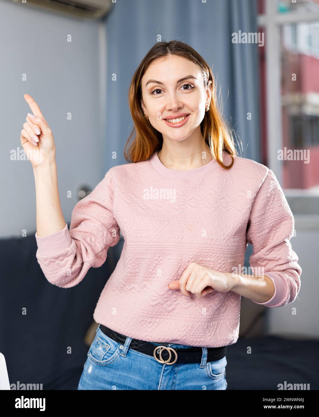 Portrait of a positive young woman Stock Photo - Alamy