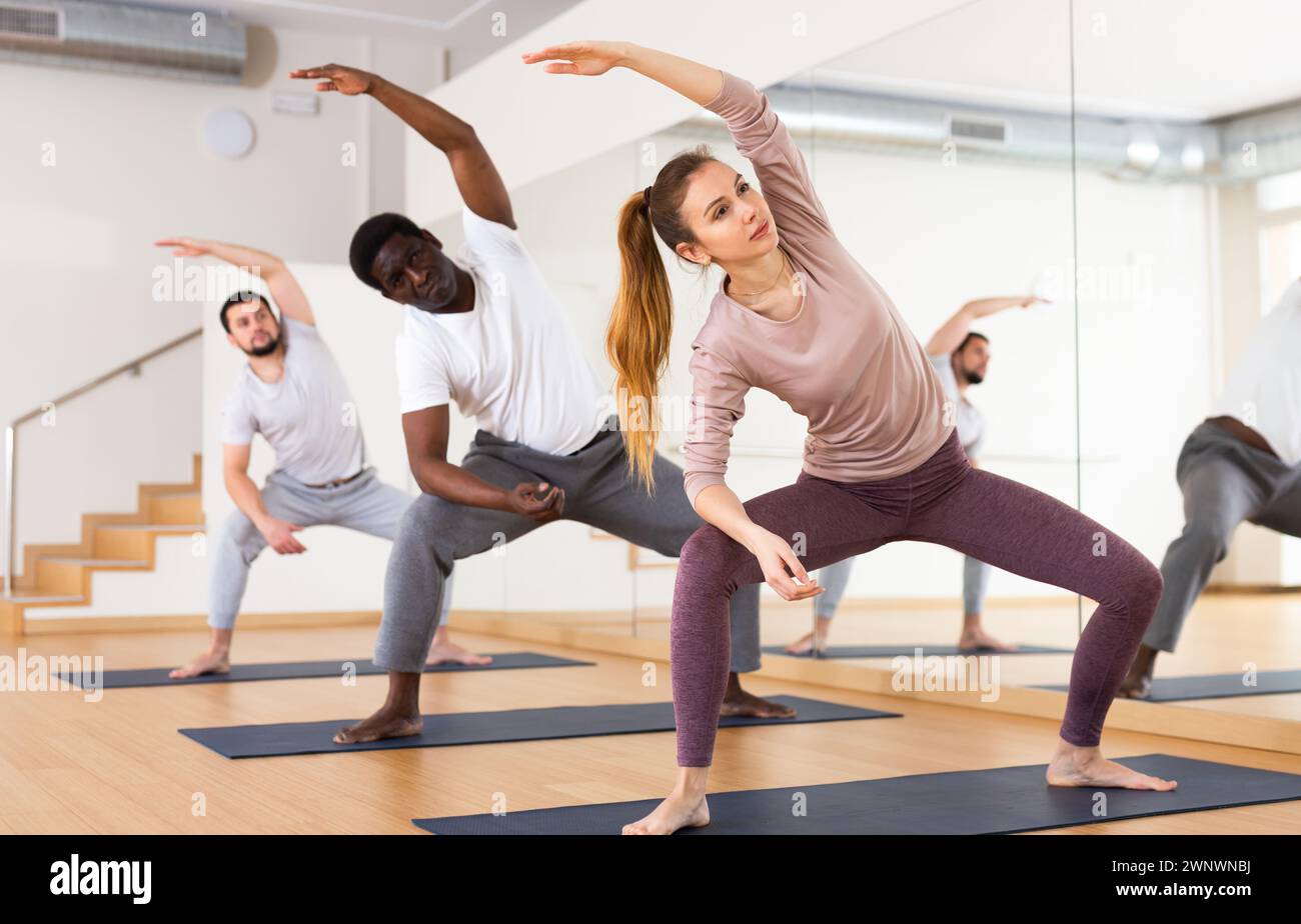 Group people doing yoga asanas hi-res stock photography and images - Alamy