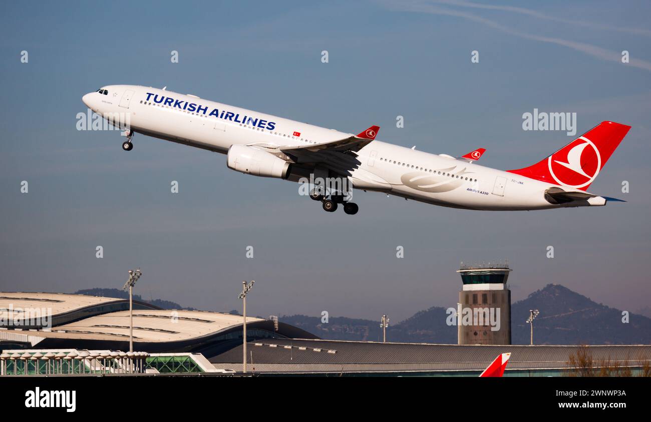 Airplane Turkish Airlines airline take off from Barcelona El Prat airport. Board number TC-JNK ...