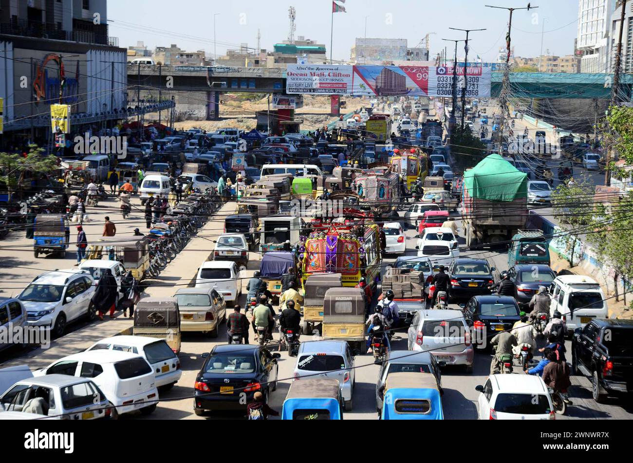 KARACHI, PAKISTAN, MAR 04: A large numbers of vehicles stuck in traffic ...