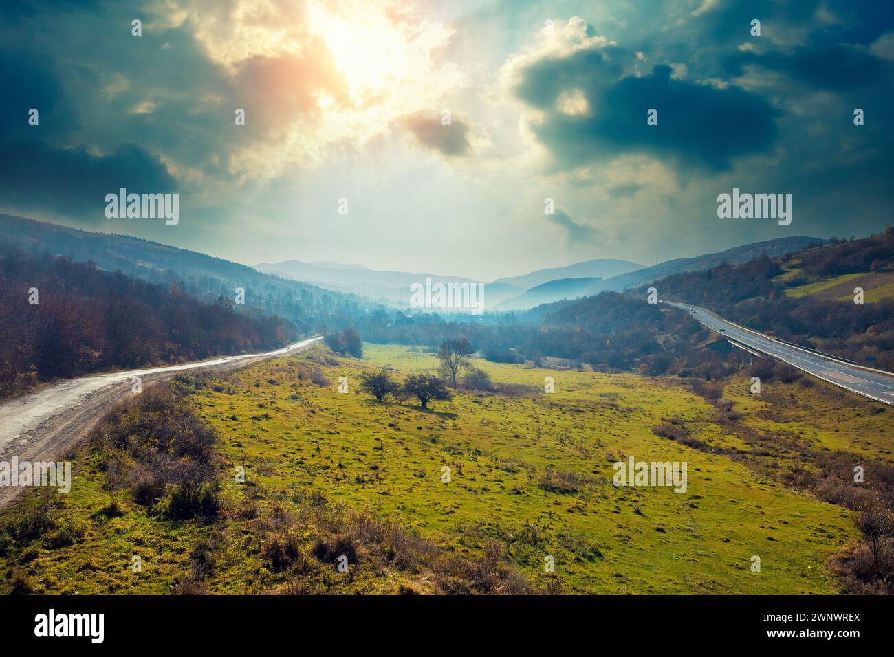 Aerial view of the countryside, country road, and highway on the hills ...