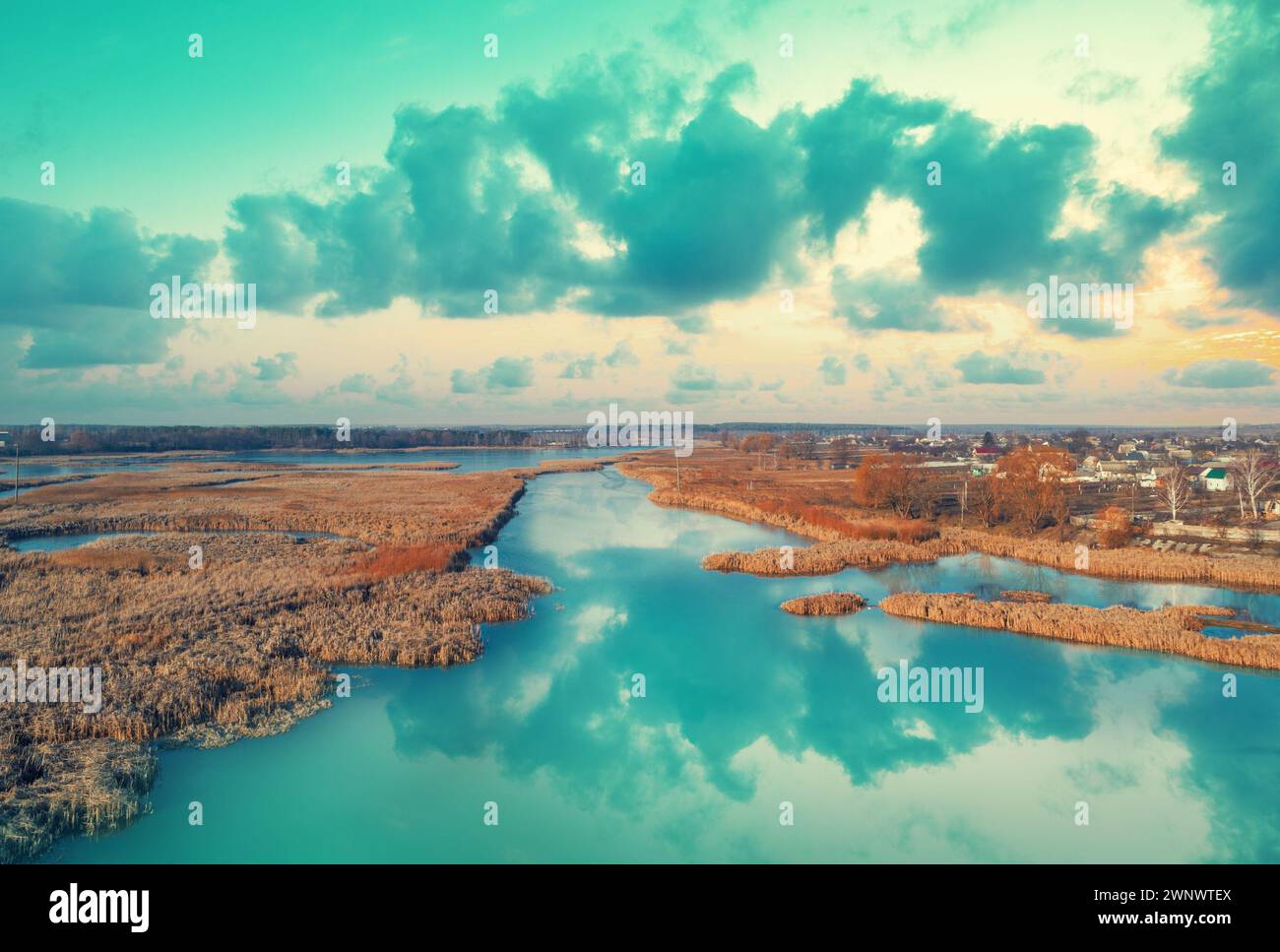 Rural landscape in the evening with beautiful sky. Aerial view of river ...