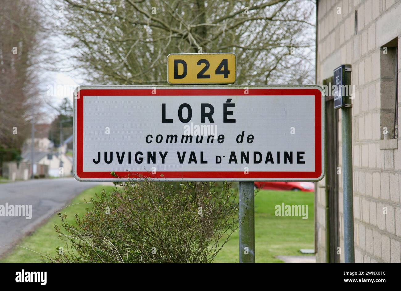 A road sign on the D24 in the village of Lore, in the Commune of ...