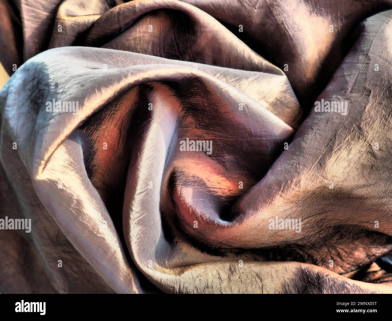 Beautiful fabric - taffeta, gently folded in waves. Crumpled material ...