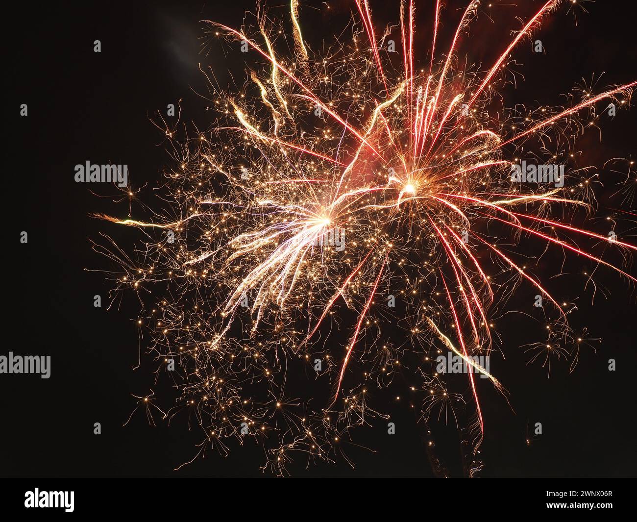 fireworks in the night sky. Colorful flashes of fire on a black ...