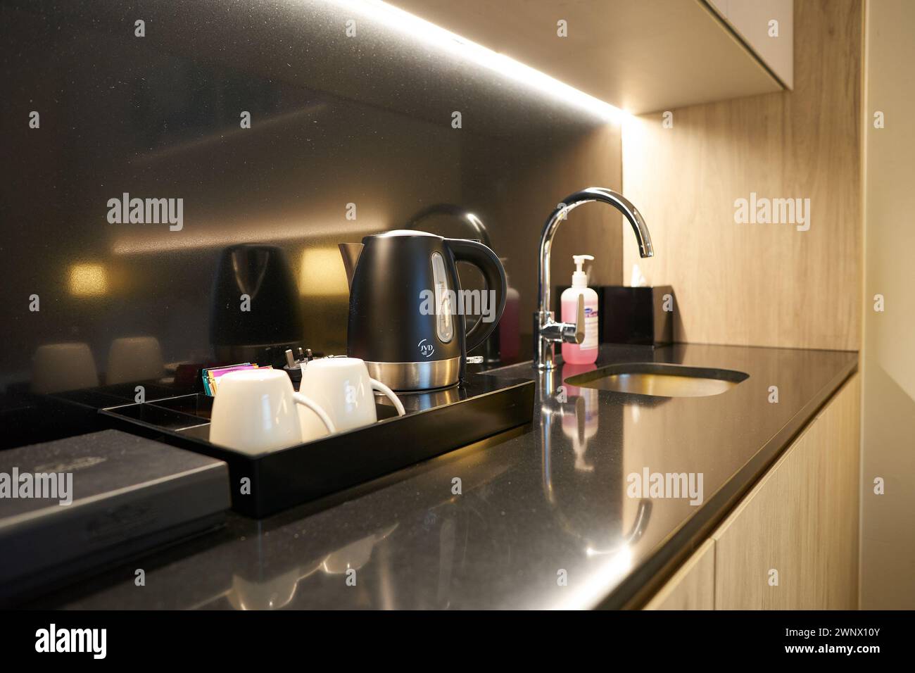 SINGAPORE - NOVEMBER 05, 2023: kitchenette area at a room in Holiday ...