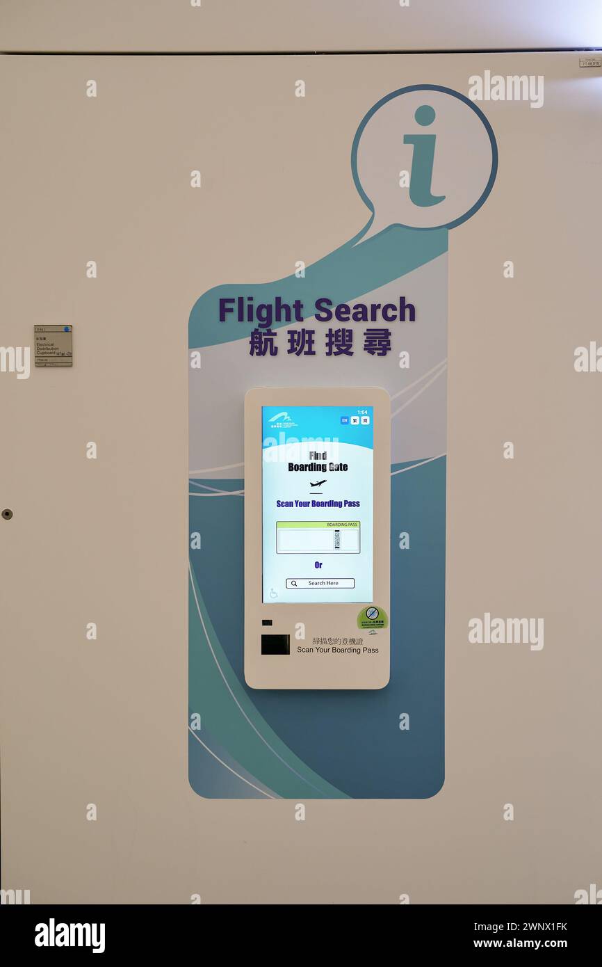 HONG KONG, CHINA - DECEMBER 08, 2023: interactive flight search self-service kiosk in Hong Kong ...