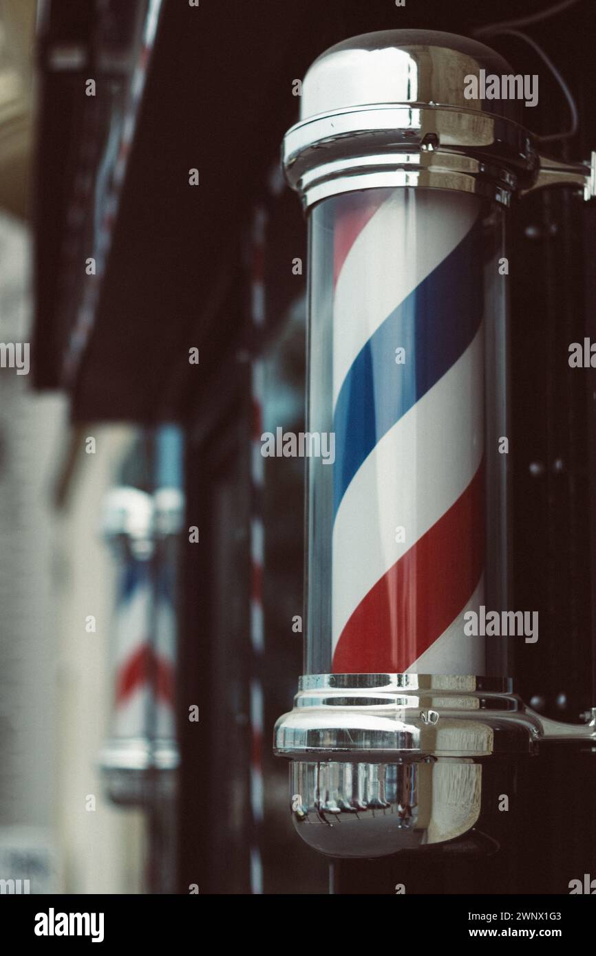 Vintage barber shop spiral sign in Budapest Stock Photo - Alamy