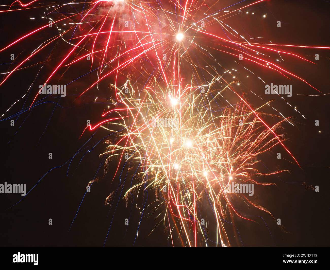 fireworks in the night sky. Colorful flashes of fire on a black ...