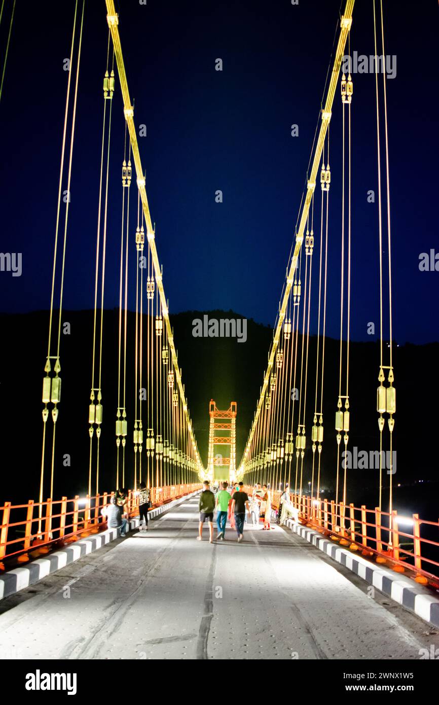 Colourful Dobra Chanti hanging bridge over Tehri Lake. Night view of ...
