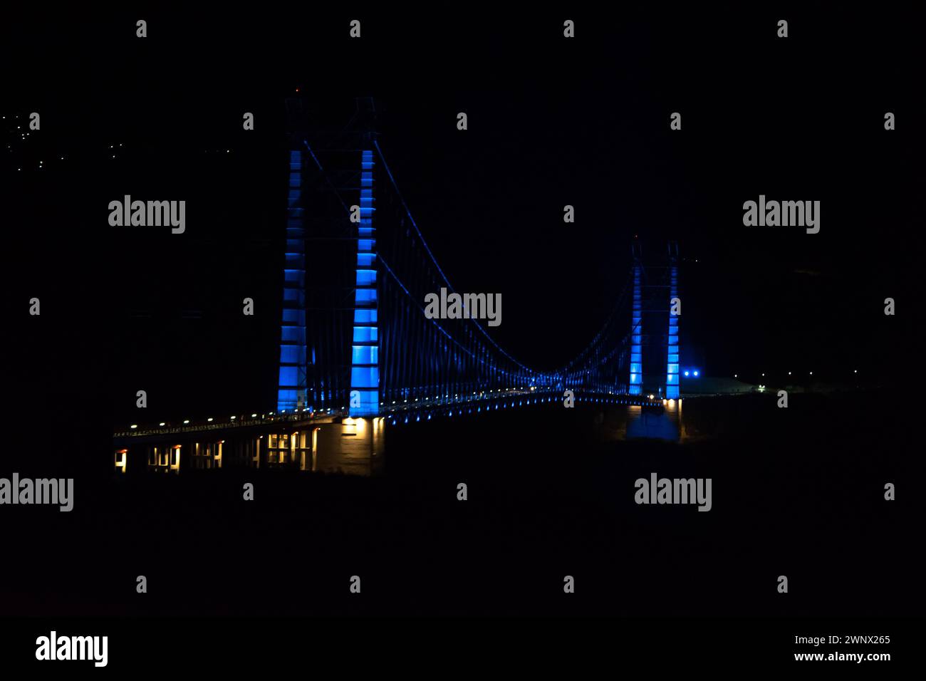 Colourful Dobra Chanti hanging bridge over Tehri Lake. Night view of ...