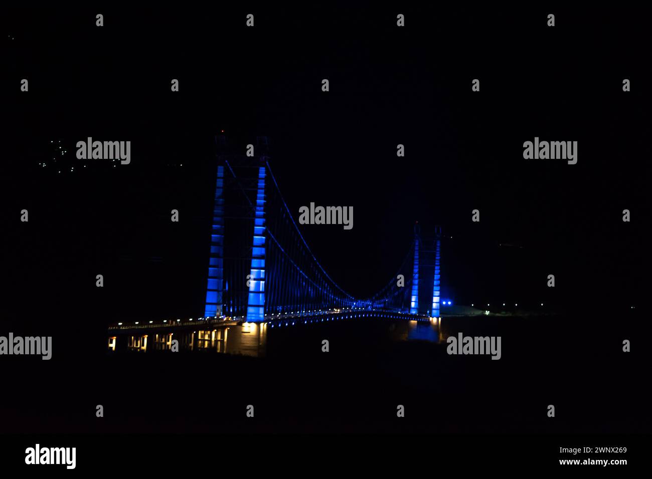 Colourful Dobra Chanti hanging bridge over Tehri Lake. Night view of ...