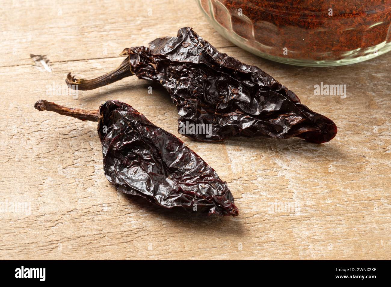 Pair of dried smoked Mexican chipotle peppers close up Stock Photo - Alamy