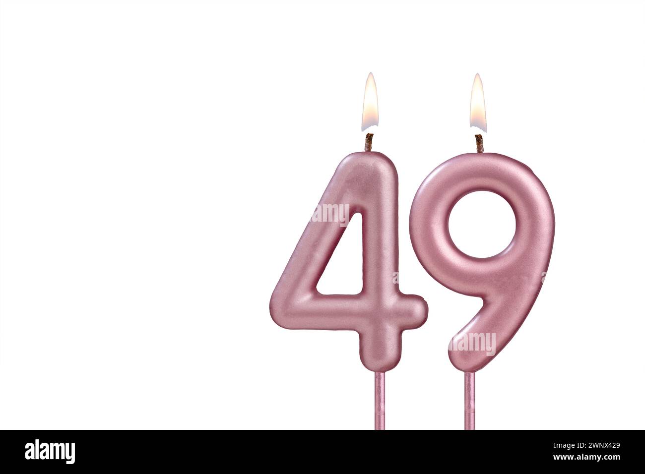 Candle number 49 - Lit birthday candle on white background Stock Photo ...