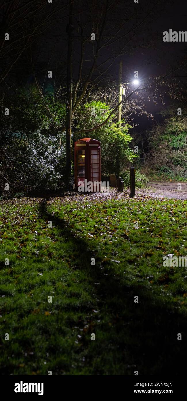 A telephone box re-purposed to house a defibrillator at night, Kent ...