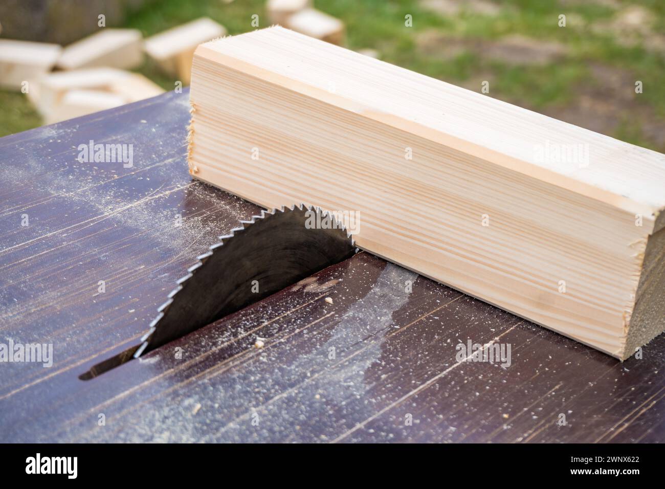 Closeup of wood cutting table with electric circular saw. Construction ...