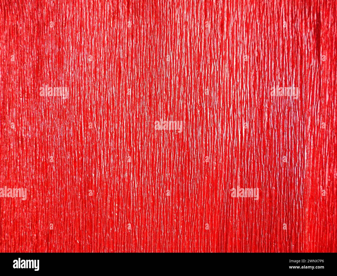 Corrugated paper in red. Uneven surface. Abstract background. Wavy ...