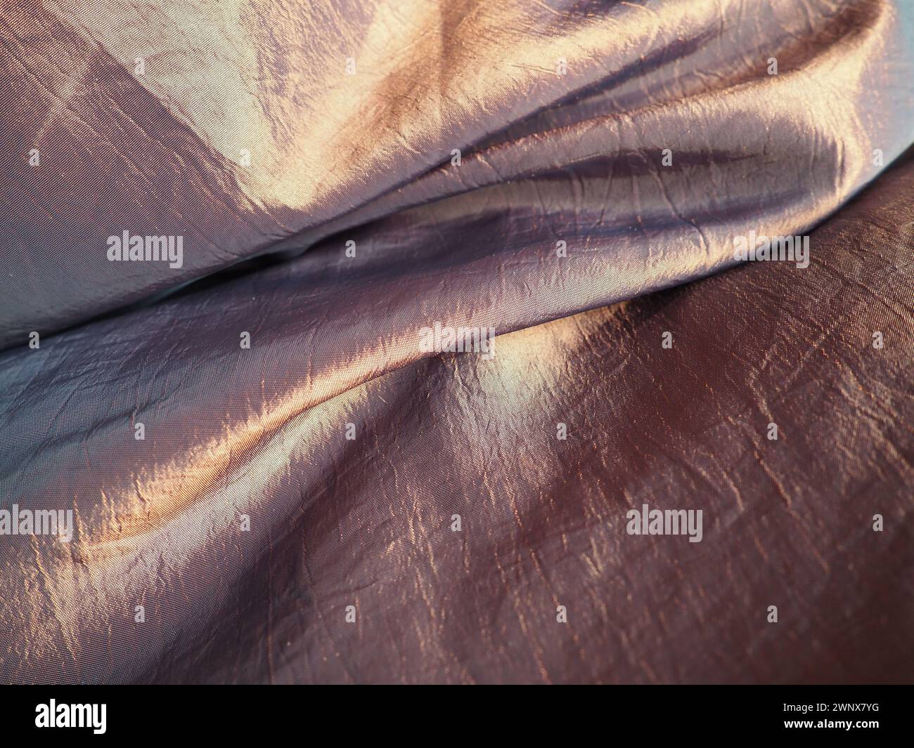 Beautiful fabric - taffeta, gently folded in waves. Crumpled material ...