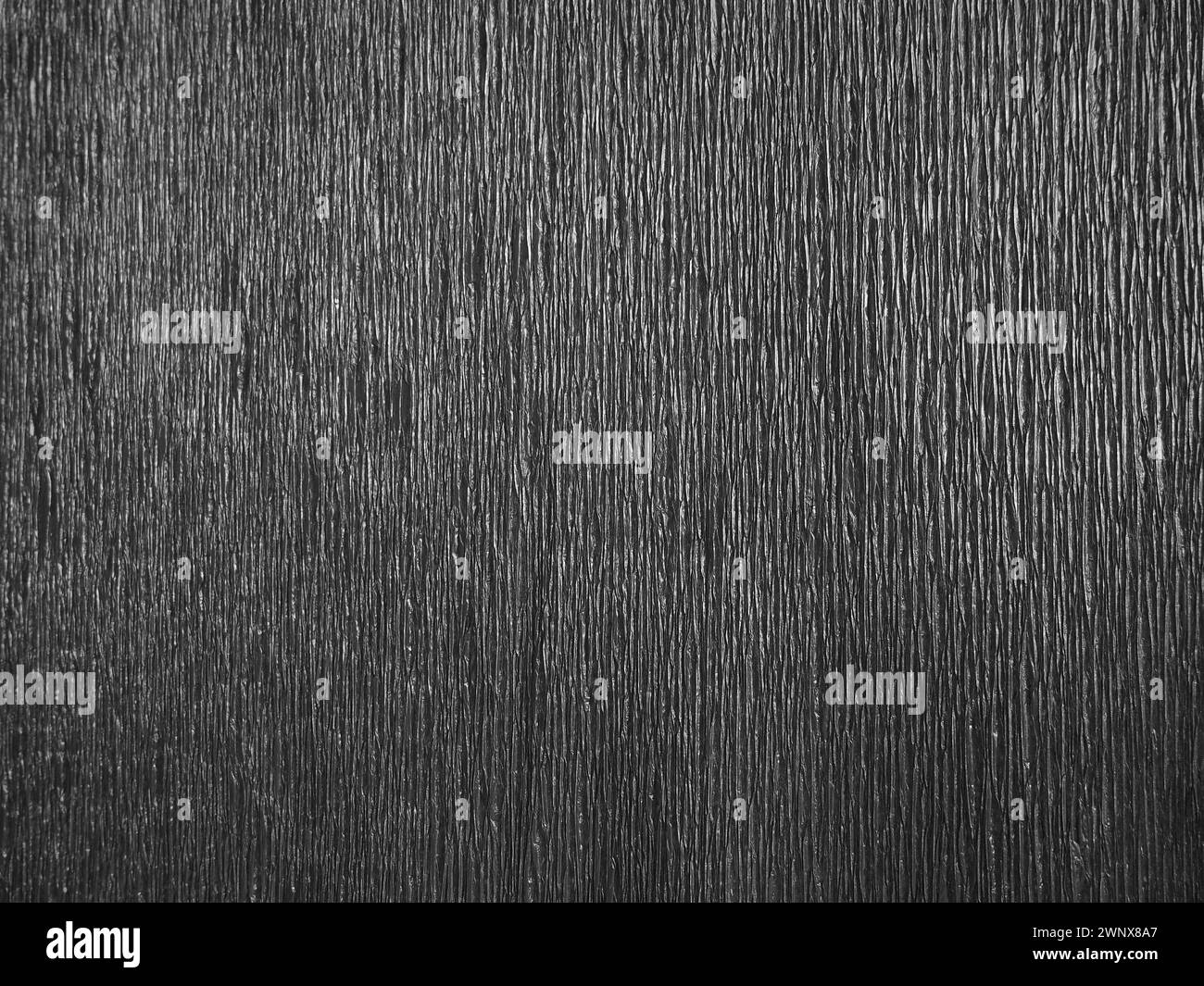 Black or gray corrugated paper. Uneven surface. Abstract monochrome ...