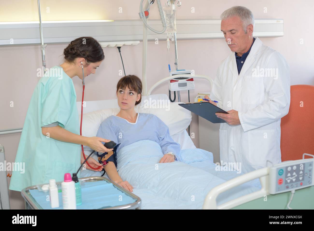 Doctor nurse telling patient hi-res stock photography and images - Alamy
