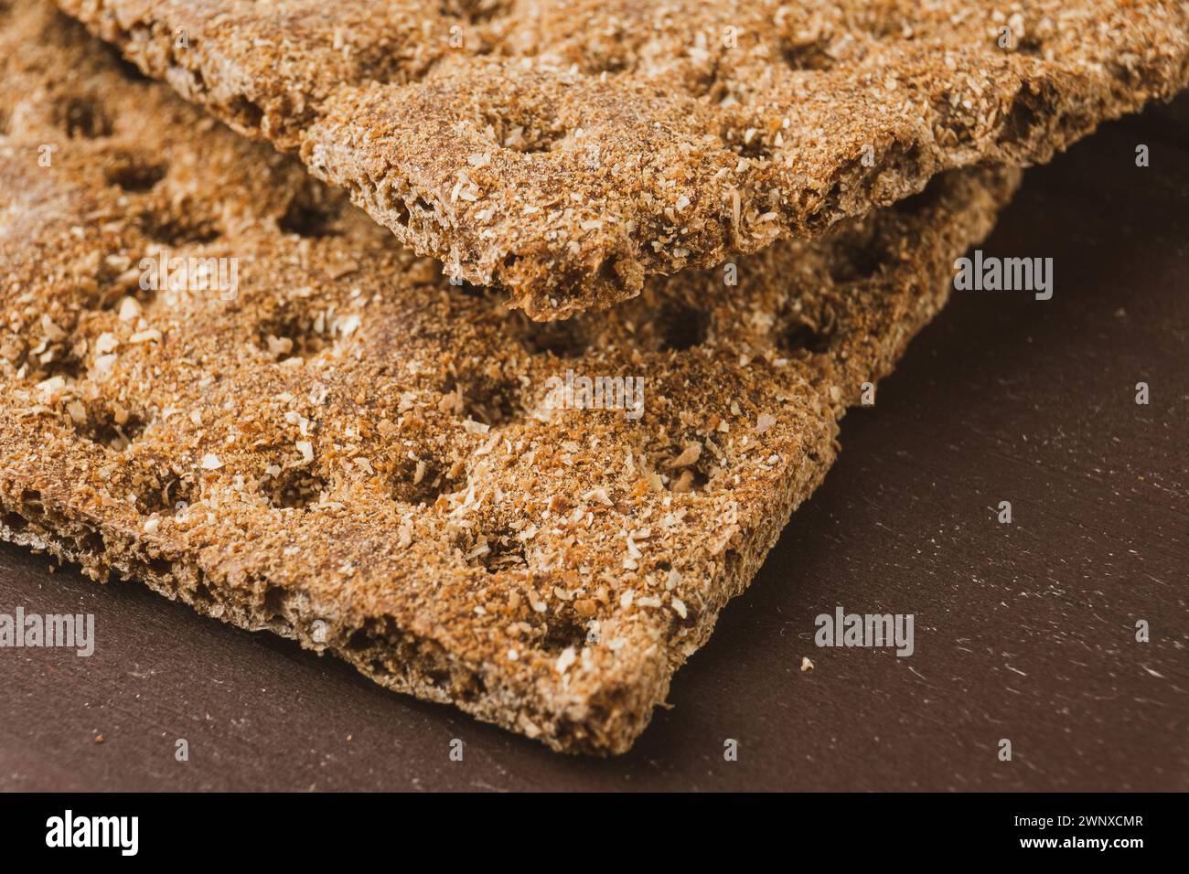 Crispy wheat, rye and corn flatbread crackers. Healthy food background ...